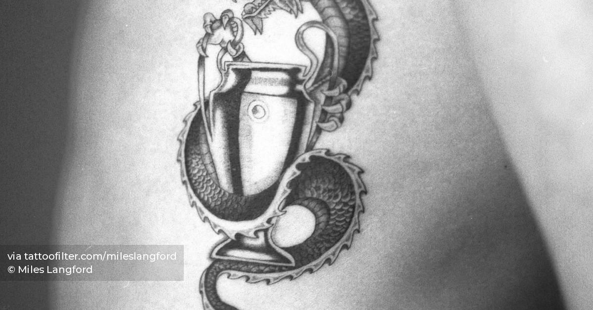Champions League trophy tattooed on Mason Mount's rib.