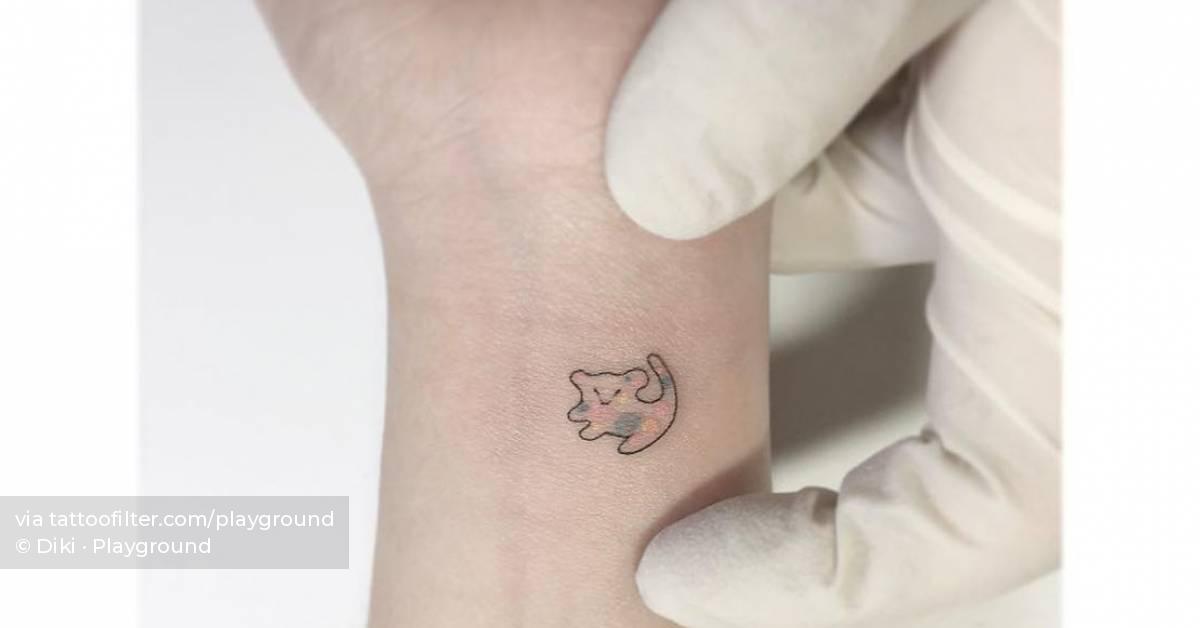 Minimalistic style Simba tattoo located on the wrist.