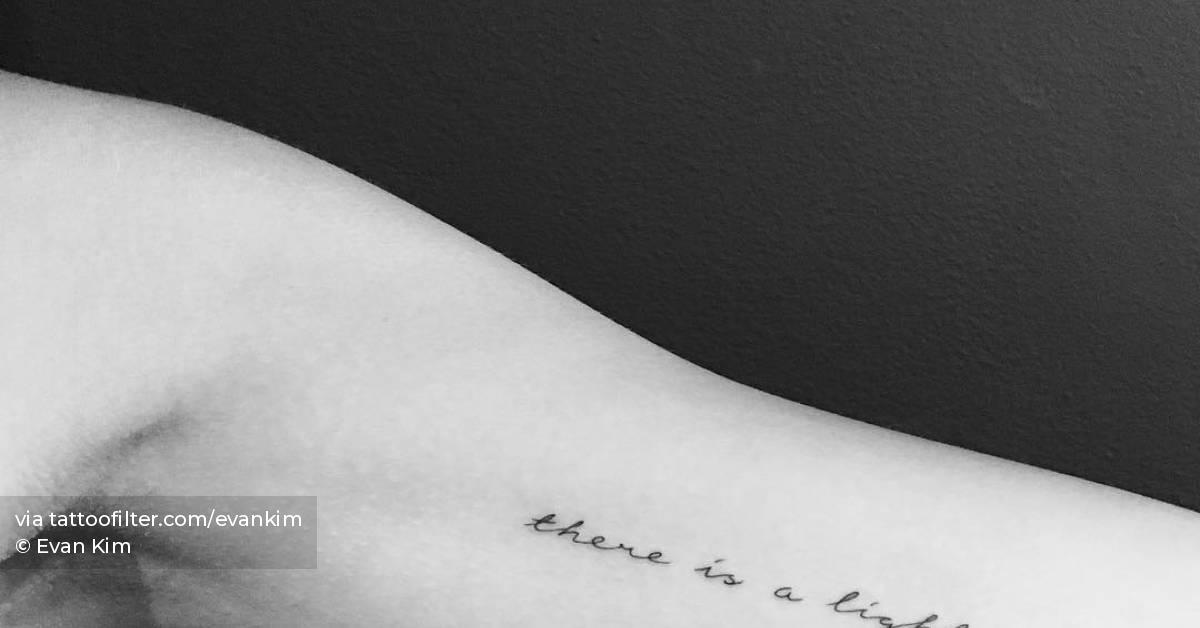 "There is a light" lettering tattoo handwritten on the