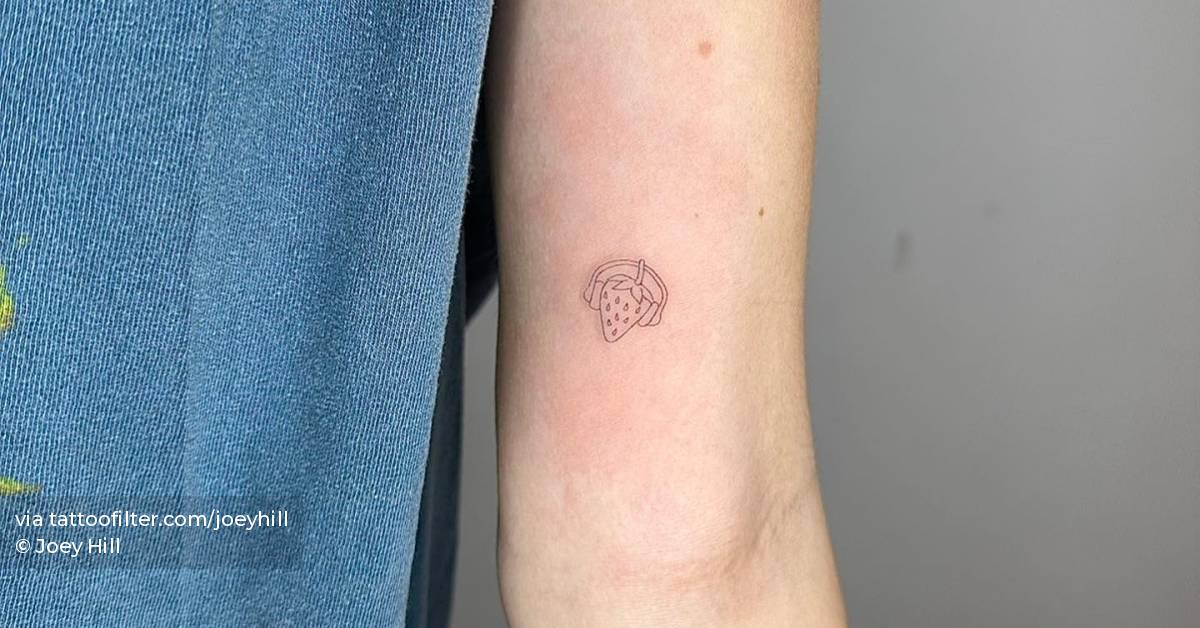 Fine line style strawberries with headphones tattoo