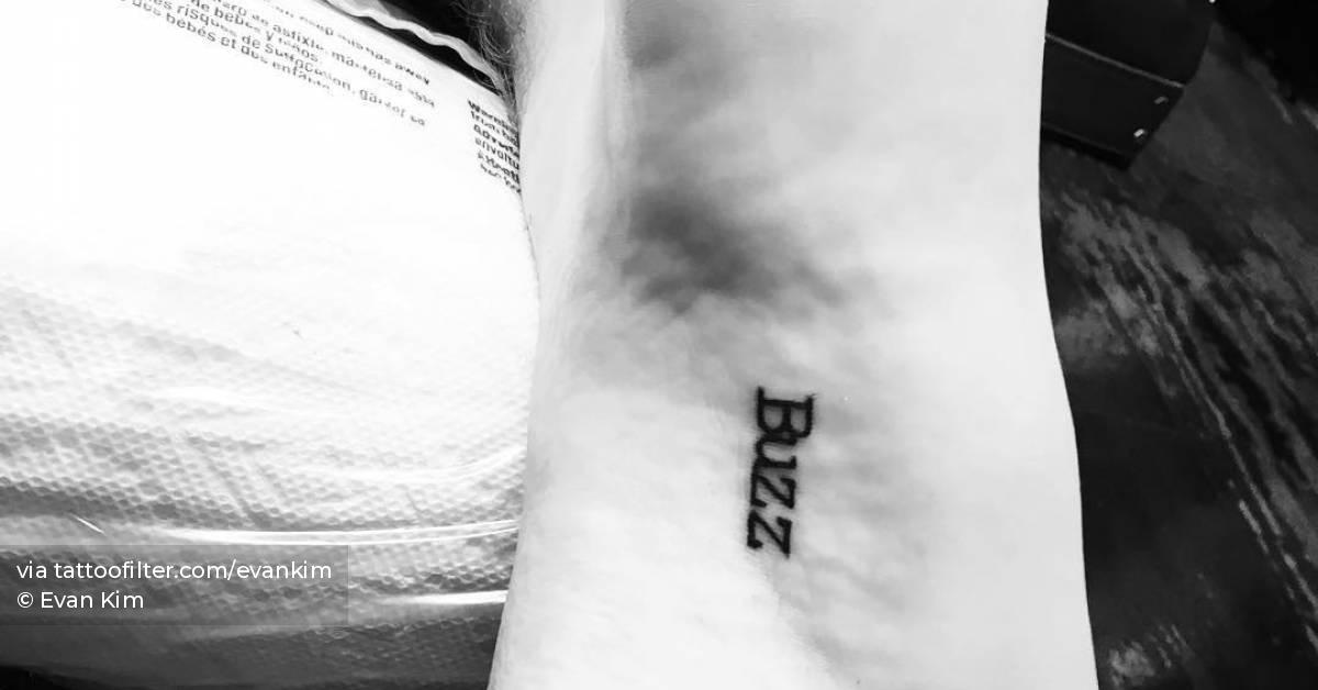 "Buzz" tattoo located on the sole of the foot.