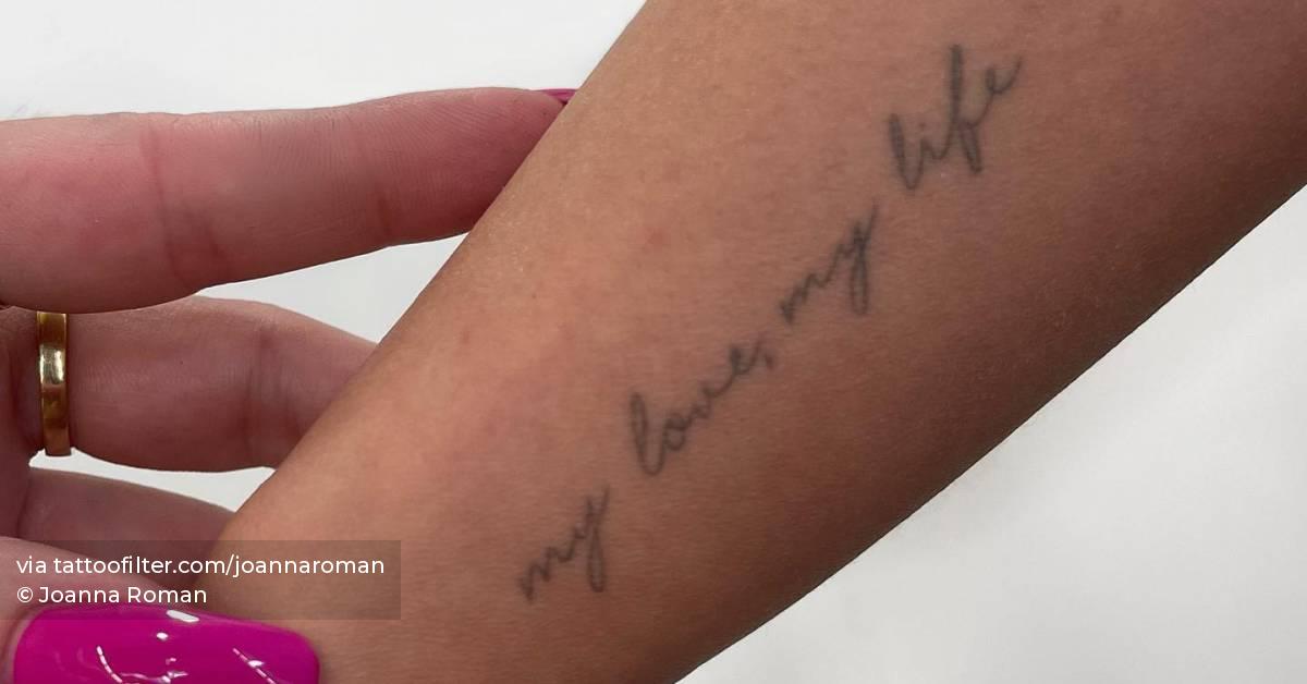 "My love, my life" healed lettering tattoo done on the