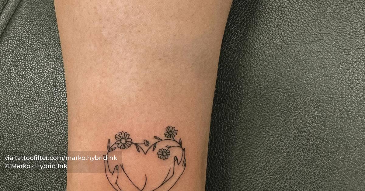 Self hug tattoo located on the ankle.