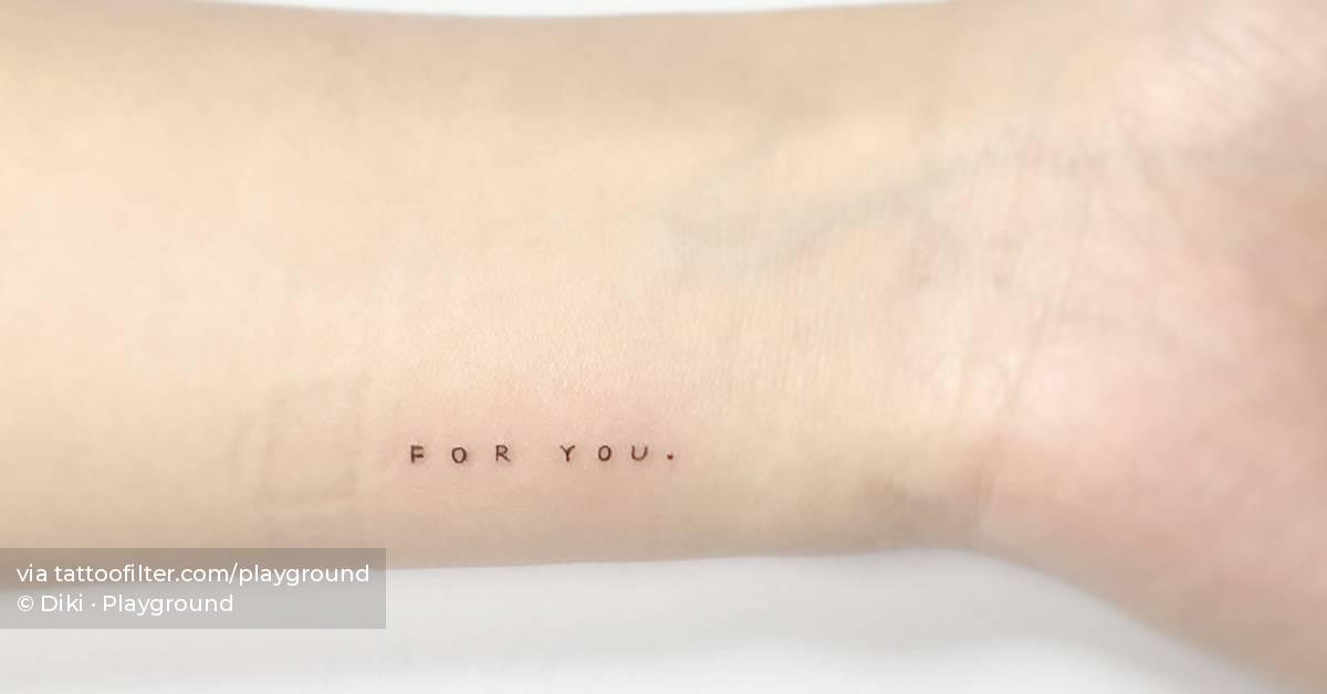 "For you" lettering tattoo placed on the wrist.