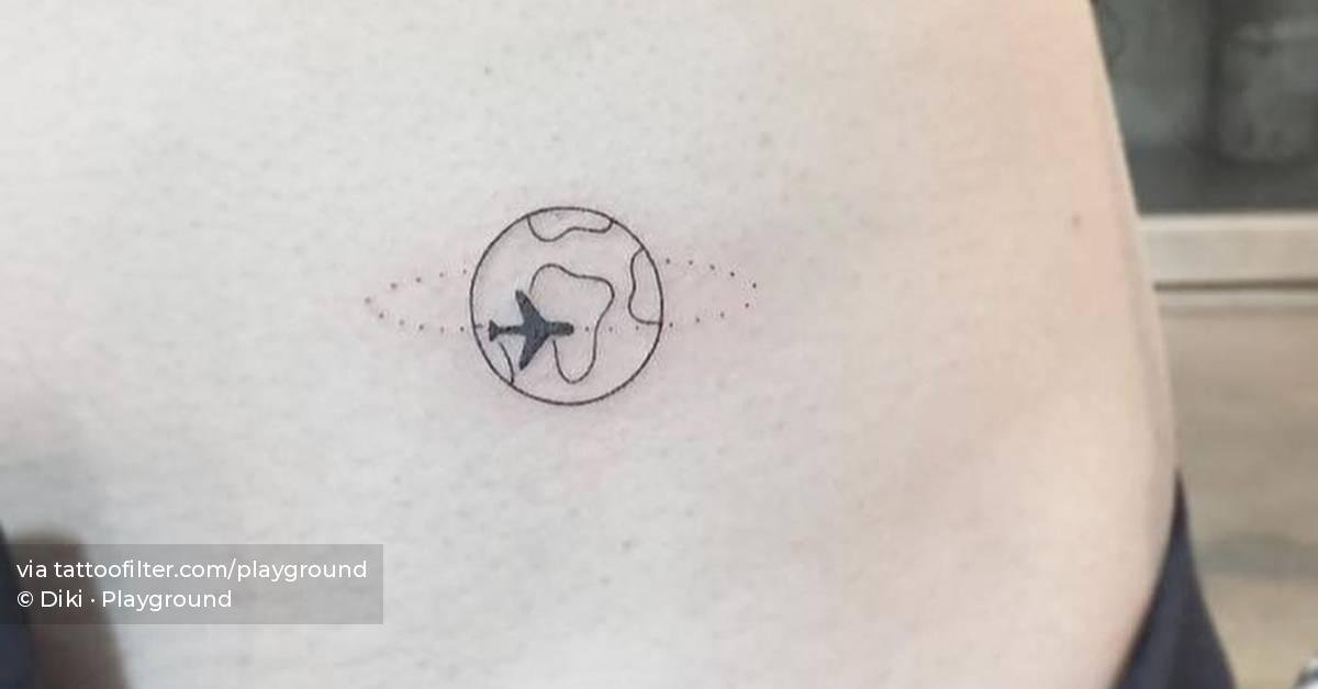 Minimalistic around the world tattoo done on the hip.