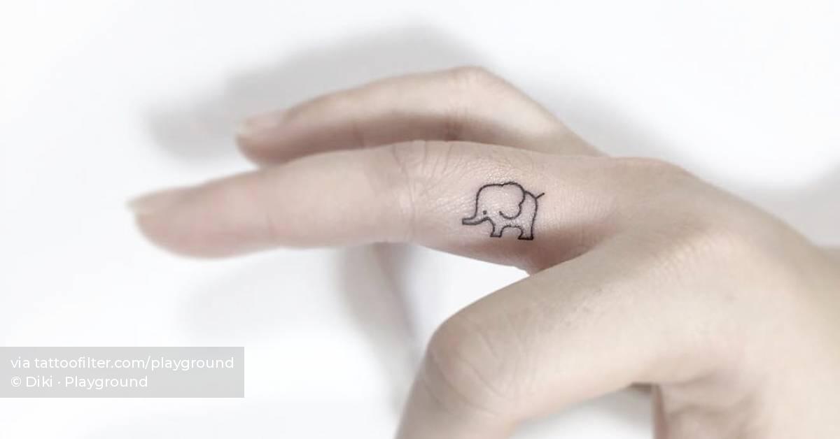 Minimalistic elephant tattooed on the finger.