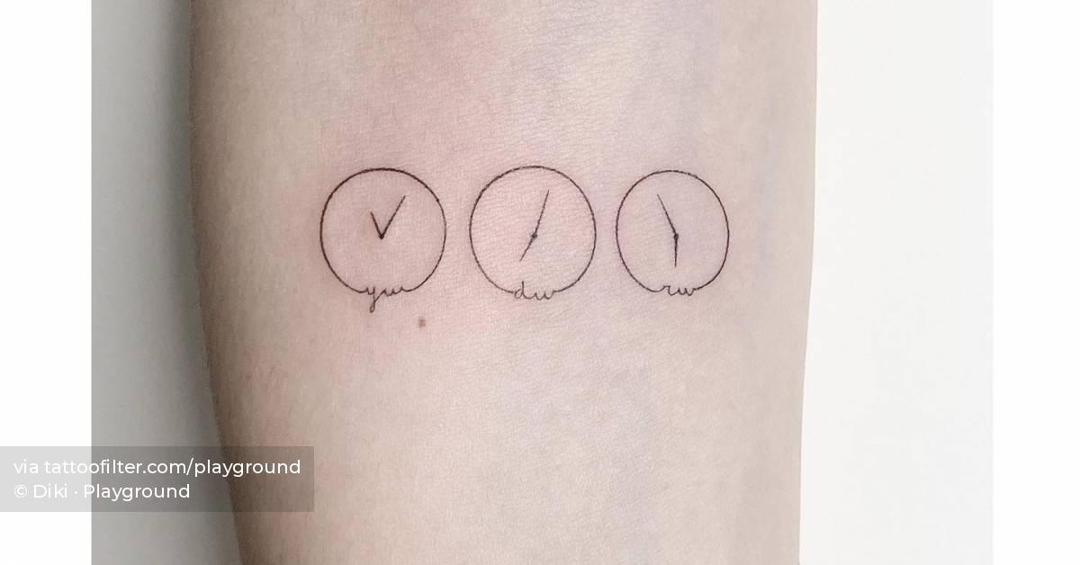 Minimalistic clocks tattooed on the inner forearm.