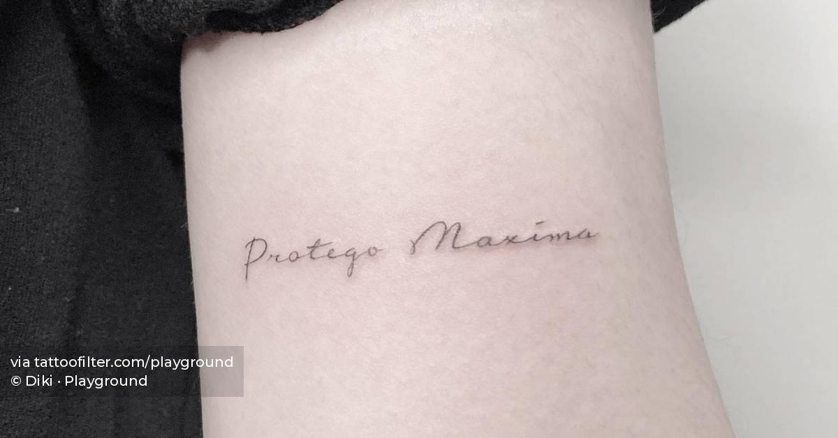"Protego maxima" lettering tattoo handwritten on the