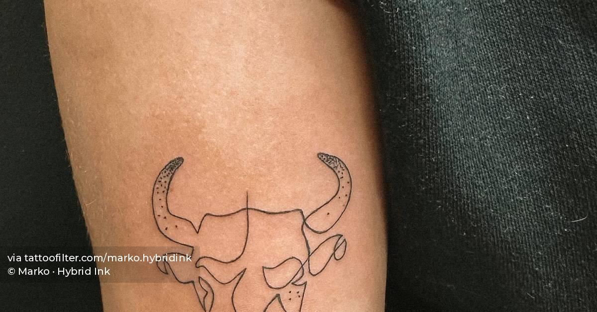 One line bull portrait tattoo done on the bicep.