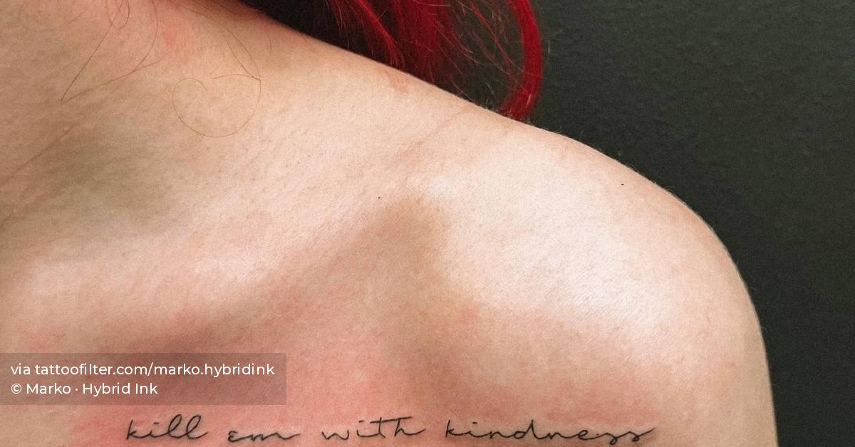 Tattoo that says ”kill em with kindness” located on