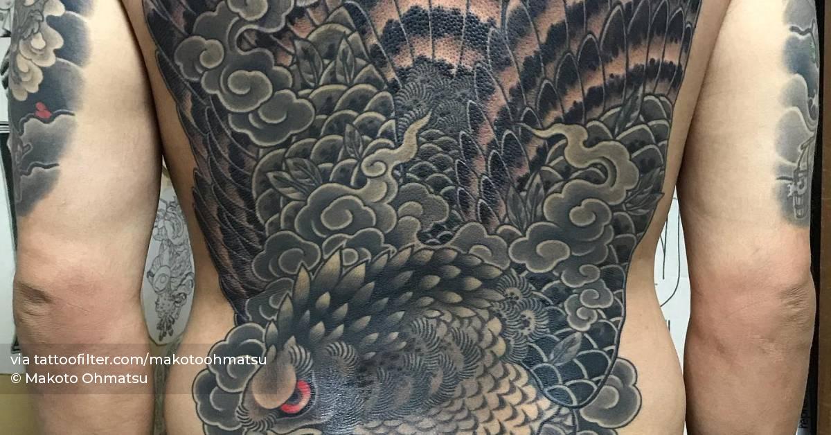 Huge eagle backpiece tattoo Irezumi style.