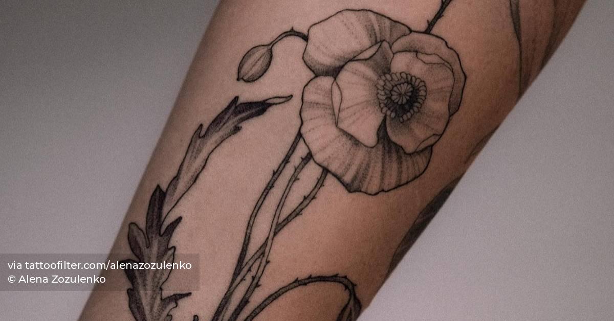Poppy flower tattooed on the inner forearm,