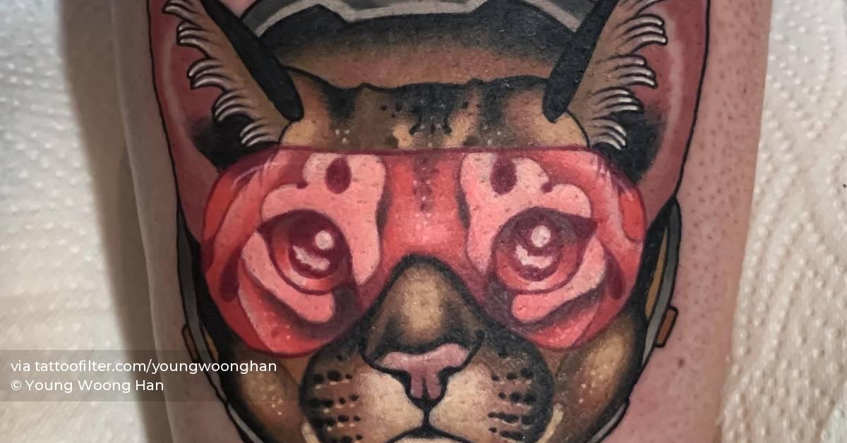 Space cat tattoo done on the calf, neotraditional