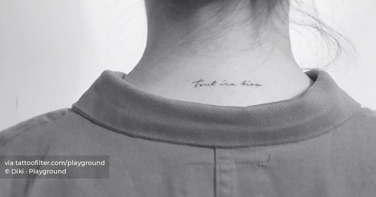 "Tout ira bien" lettering tattoo handwritten on the