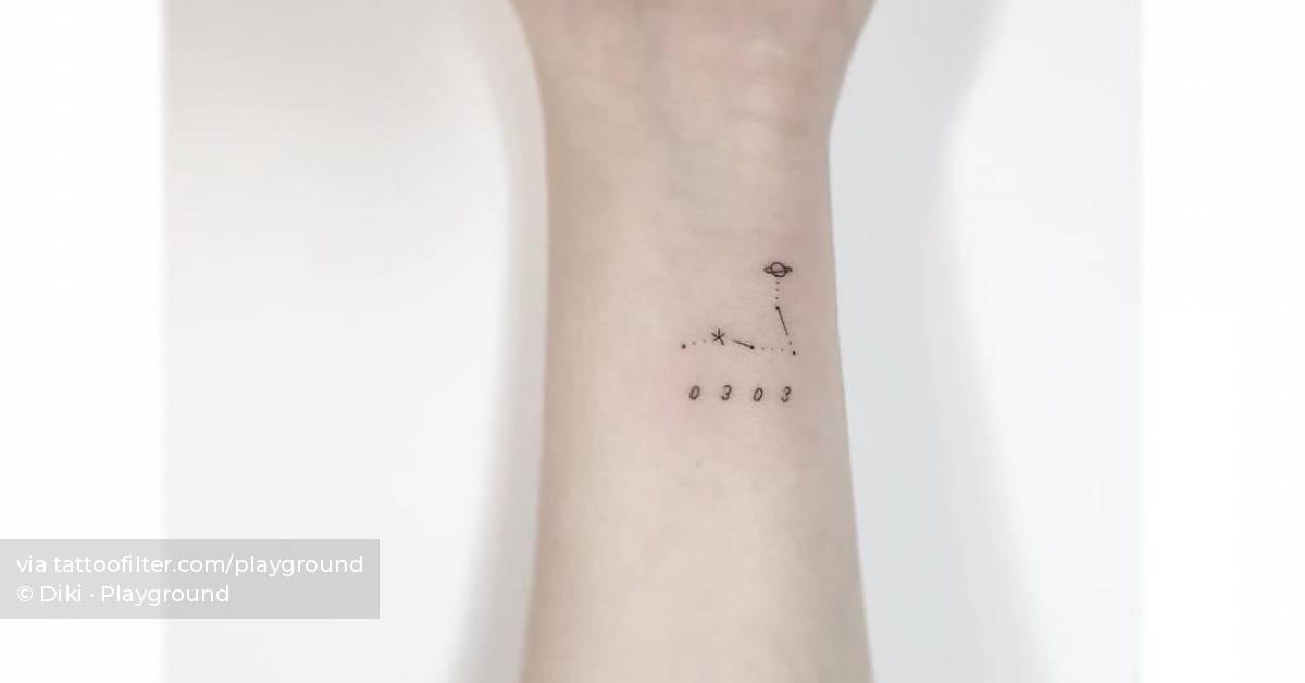 Pisces constellation tattoo located on the wrist.