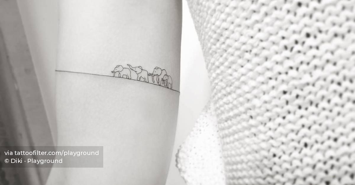 Fine line elephant family tattoo located on the inner