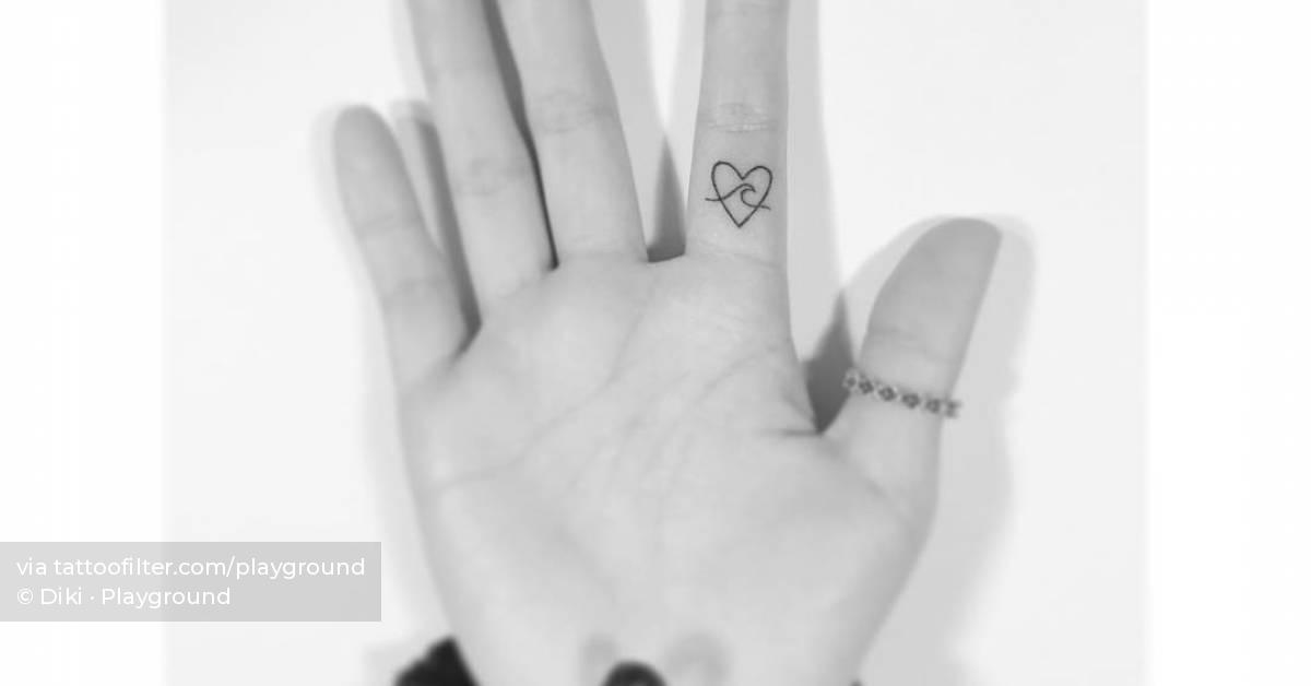 Heart and wave tattooed on the finger, minimalistic