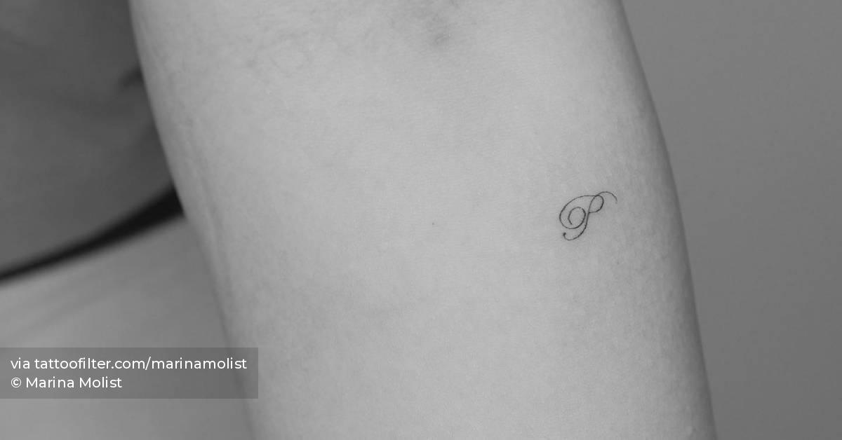 Minimalistic tattoo of the letter "P" done on the inner
