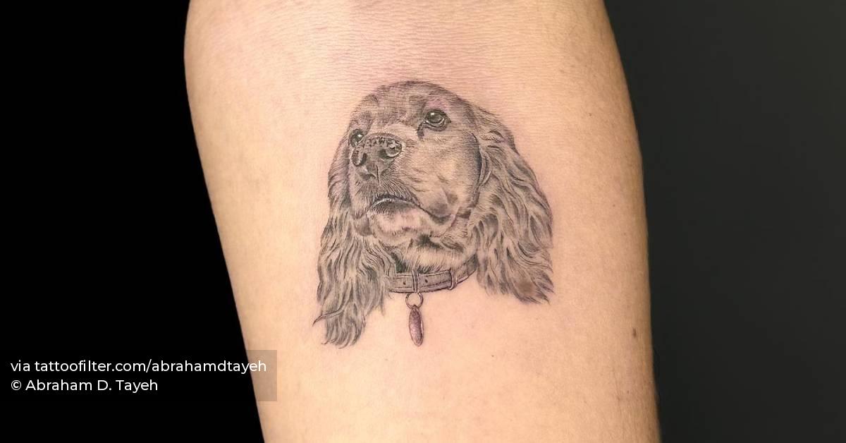 Cocker Spaniel portrait tattoo located on the inner
