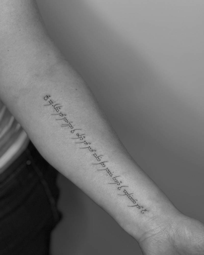 Elvish Script Tattooed On The Inner Forearm 
