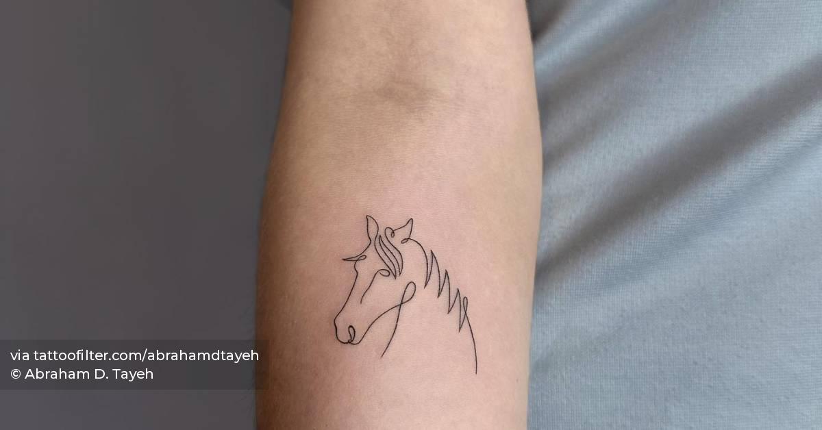One line horse portrait tattoo located on the inner