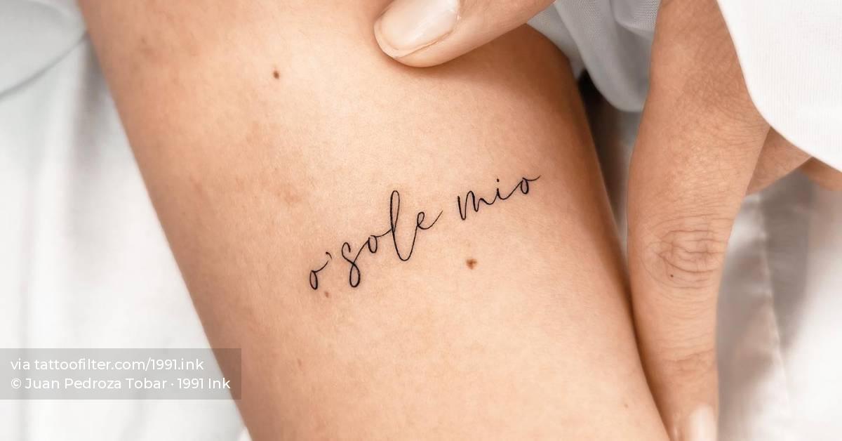 “O' sole mio” lettering tattoo located on the