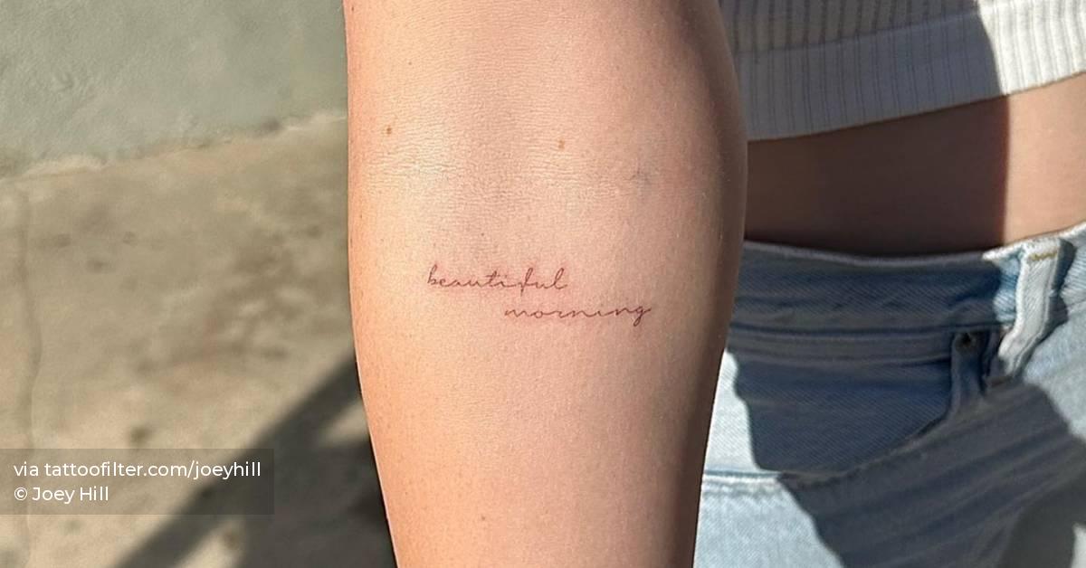 Tattoo that says "beautiful morning" handwritten on the
