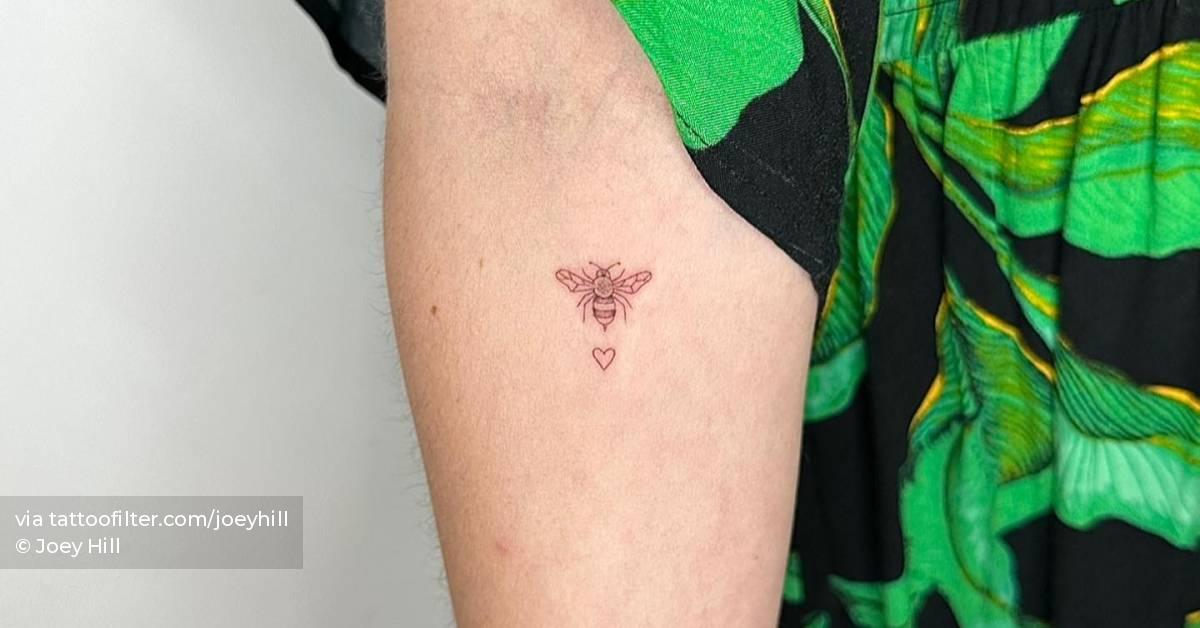 Fine line bee and heart tattoo located on the inner