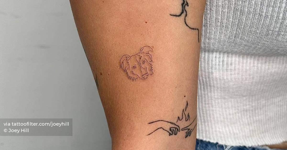 Fine line style Border Collie portrait tattoo located