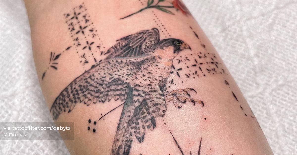 Micro-realistic falcon tattoo located on the inner