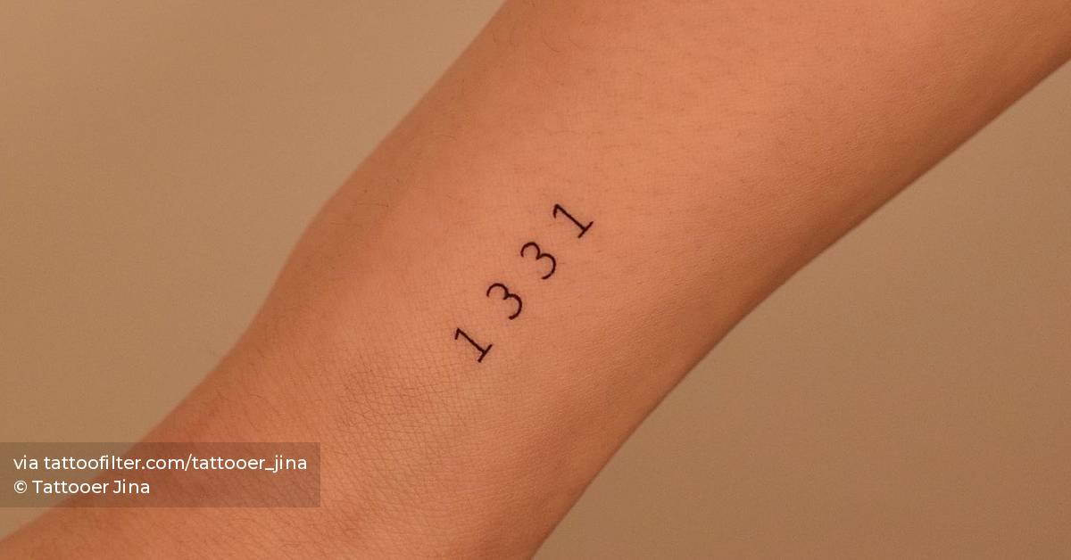 Tattoo of the number "1331" located on the wrist.