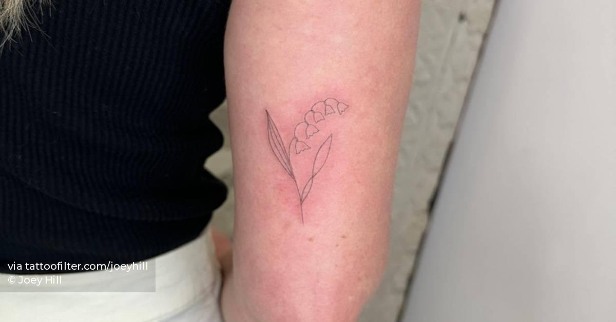 Fine line style lily of the valley tattoo done on the