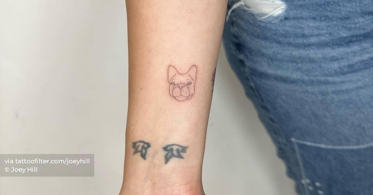 Fine line style French Bulldog tattoo located on the