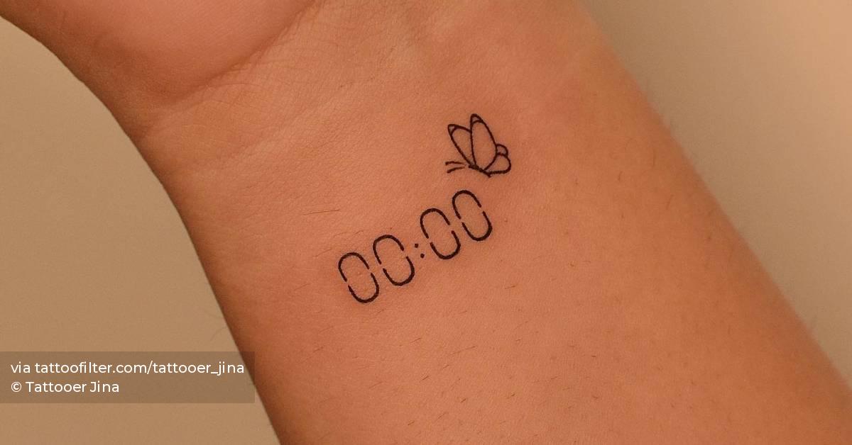 Hour tattoo located on the wrist.