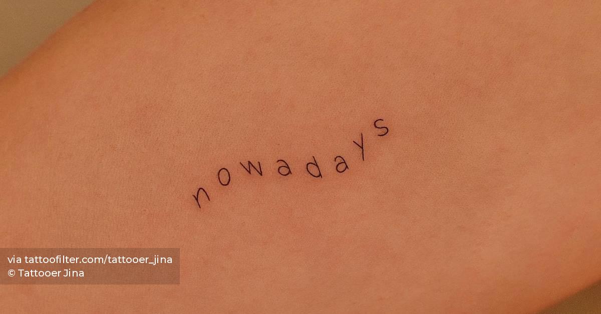 "Nowadays" lettering tattoo located on the inner
