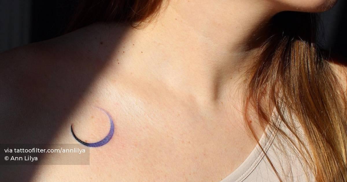 Spectrum moon tattoo located on the collarbone.