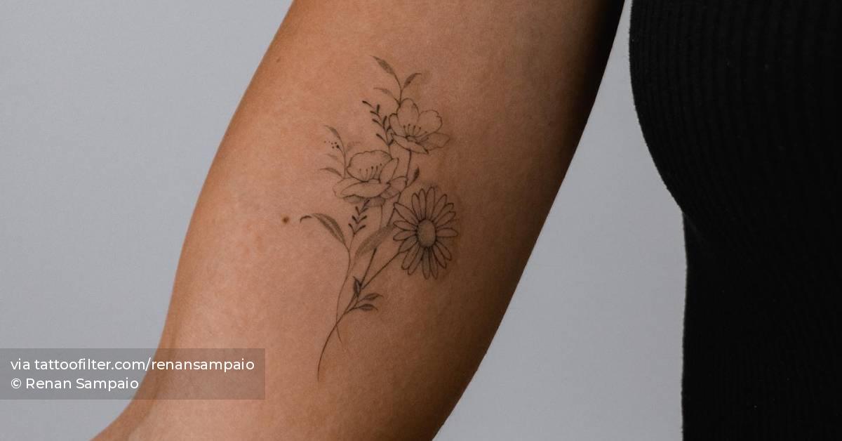 Flower bouquet tattoo done on the inner forearm,