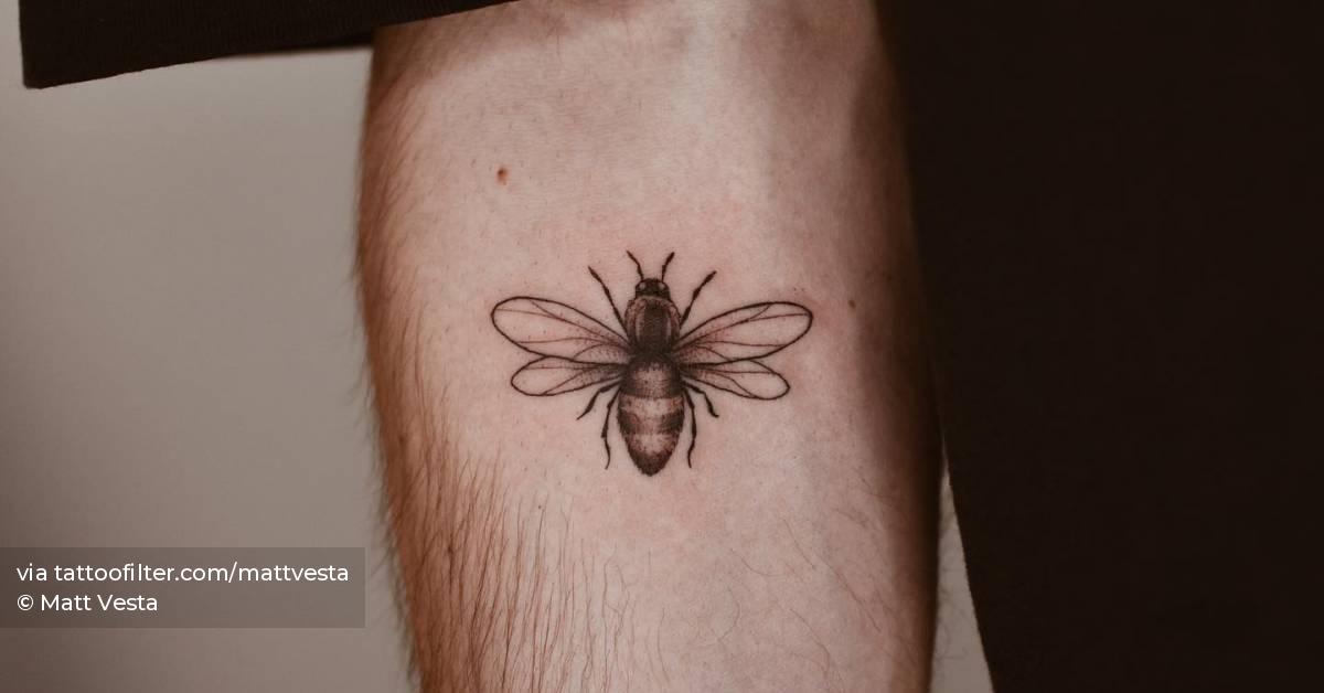 Tattoo of a bee done in illustrative style located on