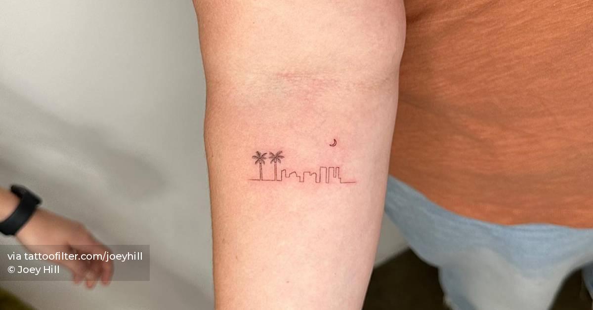Minimalistic Los Angeles skyline tattoo located on the