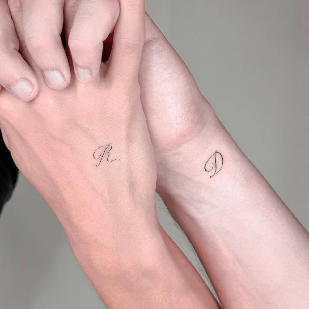 Matching Initials R And D Tattoo For Couple Matching Initials R And D Tattoo For Couple