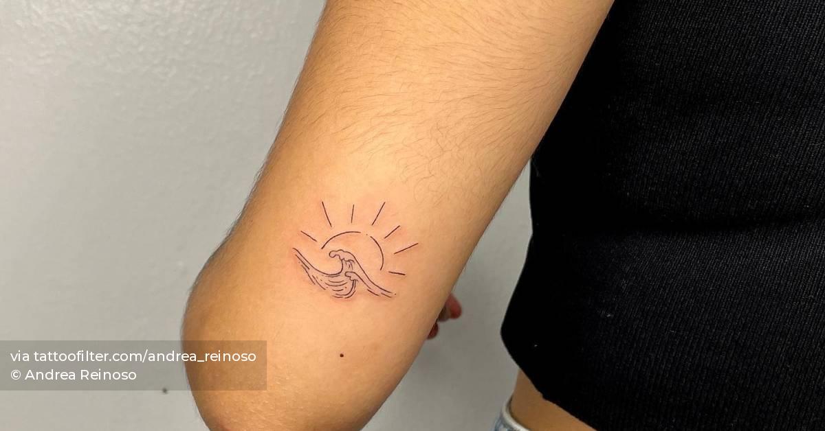 Fine line style sun and wave tattoo located on the