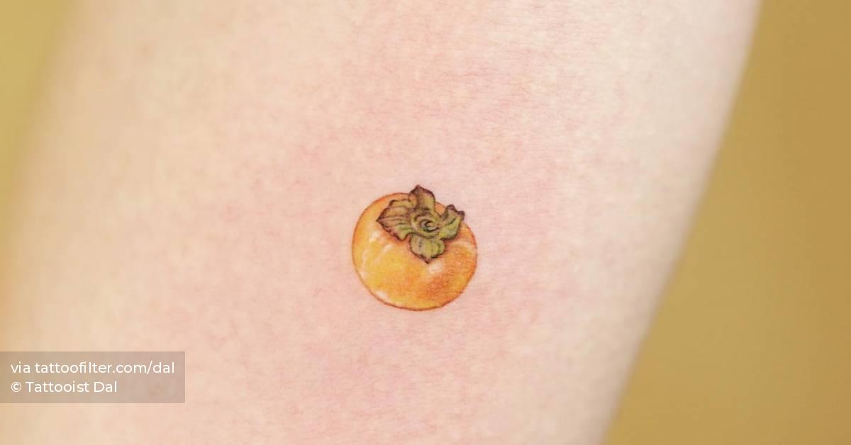 Tiny persimmon tattoo done on the inner forearm.