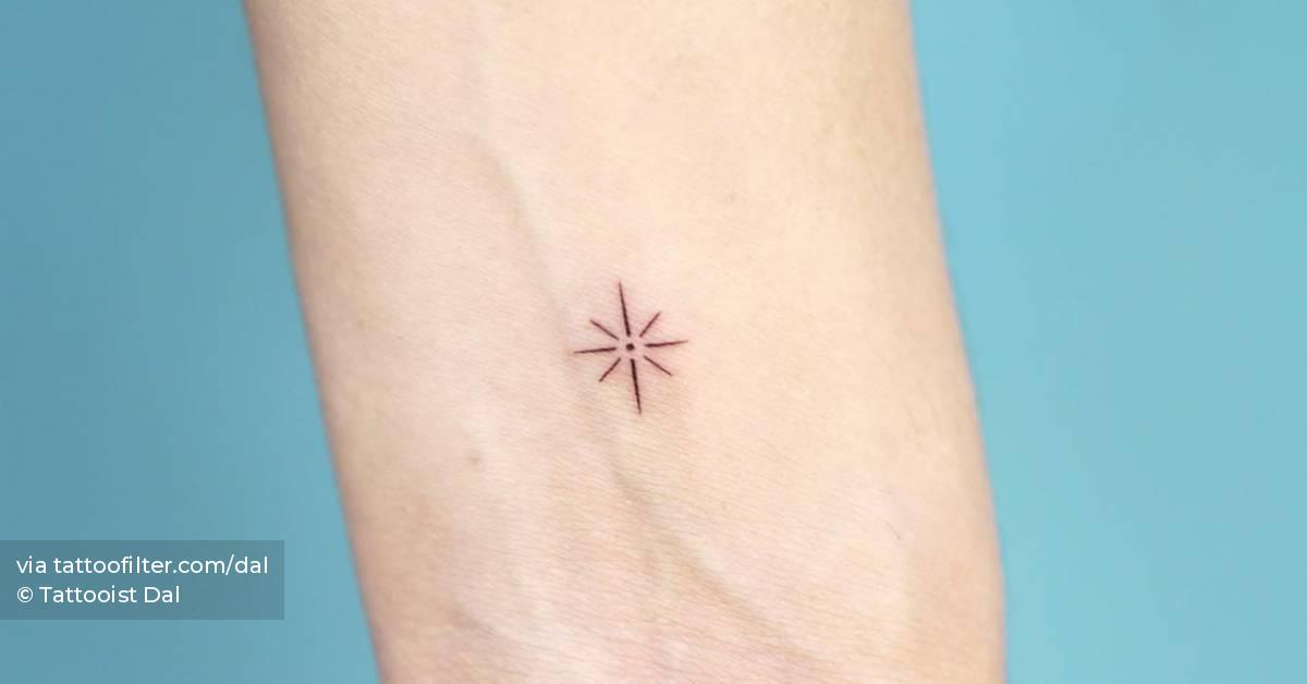 Minimalistic style north star tattoo located on the