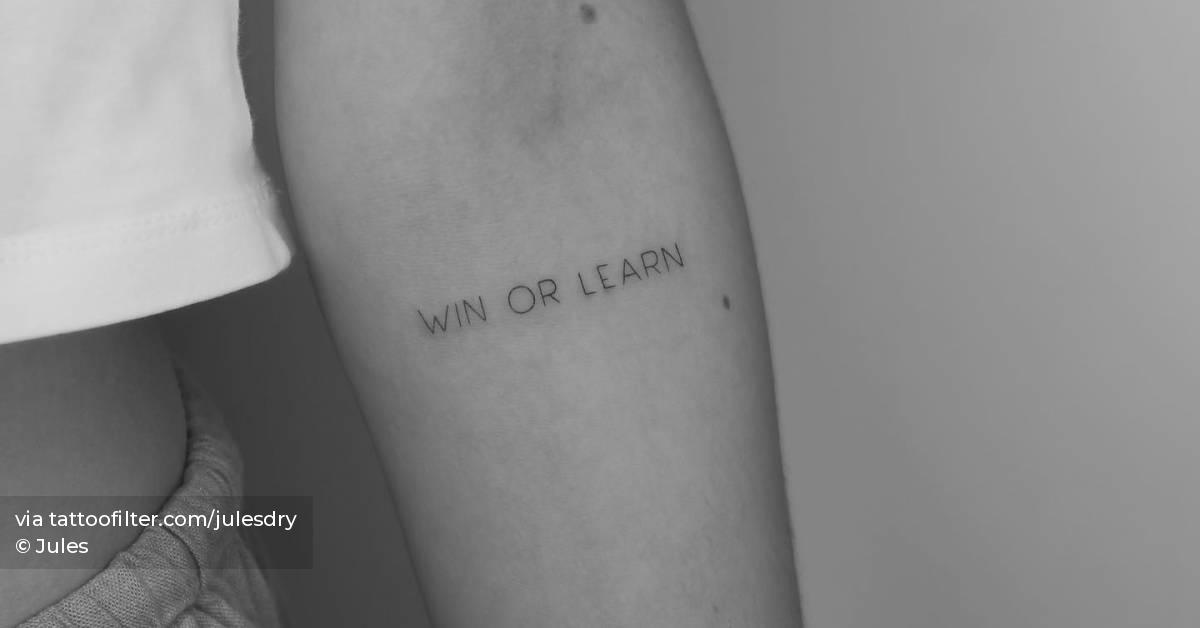 "Win or learn" lettering tattoo handwritten on the