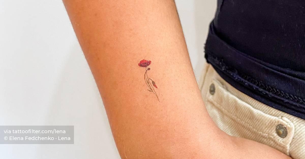 Small watercolor poppy temporary tattoo located on the