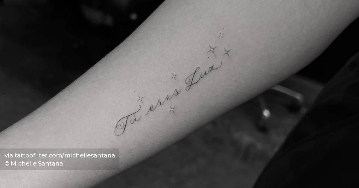 "Tú eres luz" lettering tattoo placed on the inner