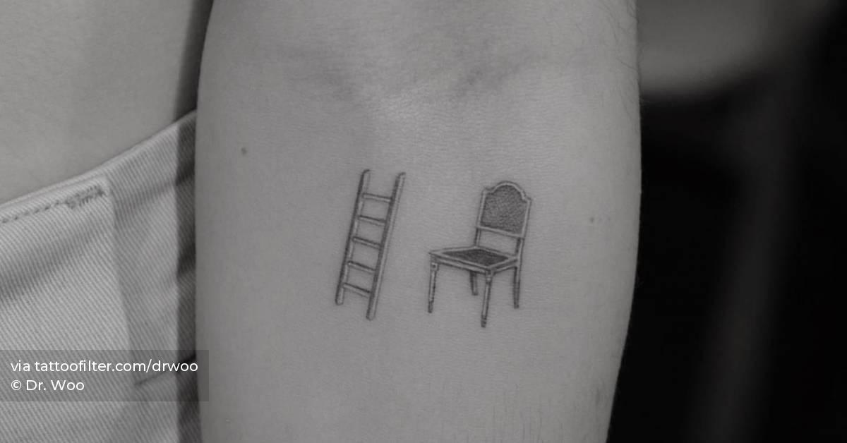 Single needle chair and ladder tattoo located on the