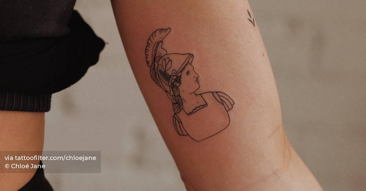 Fine line style Athena portrait tattoo located on the