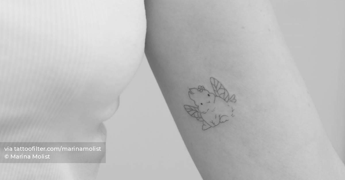 Cute bunny tattoo located on the inner arm, fine line