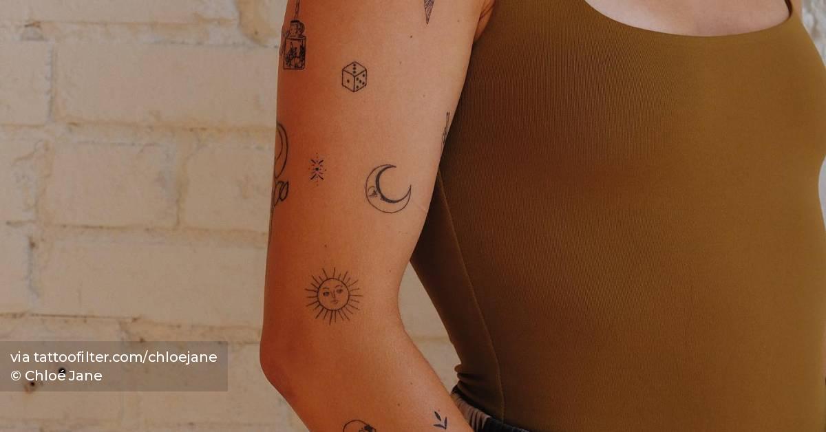 Illustrative style arm composition tattoos.